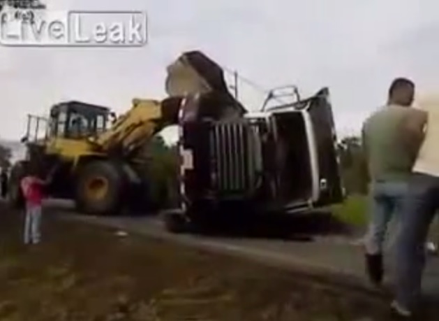 Wheel loader helps truck but it's partially successful. :-)