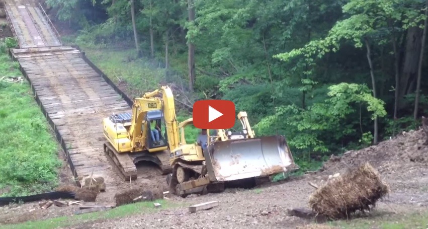 Steep slippery slope for a dozer and excavator