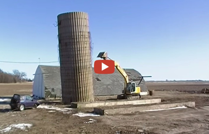 Excavator Pushing Silo Crashing Totaling a Car Geo Tracker
