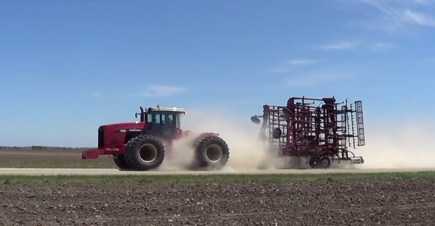 A Versatile 535 Tractor rolling down an Iowa road.