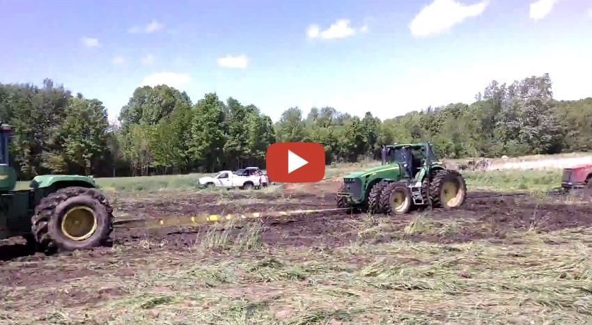 Steiger 335 pull out.Takes three big tractors to pull him out.