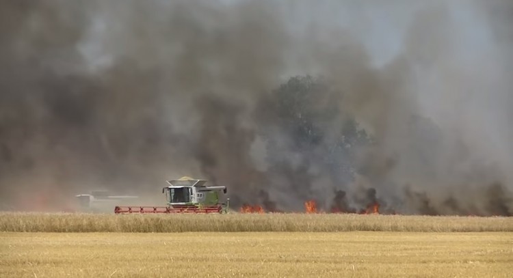 Big fire by harvest grain