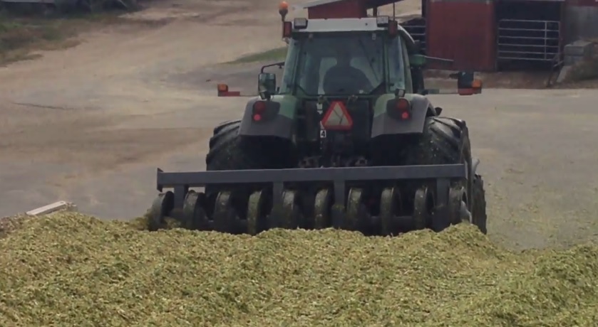 Silage packer using train wheels