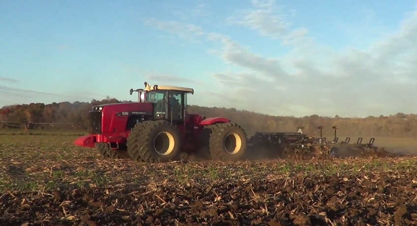 Versatile 535 Tractor pulling an M&W Earthmaster Chisel Plow (Mike Less)