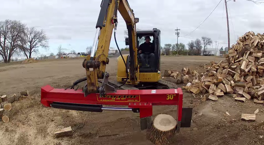 Mini Cat excavator with wood splitter