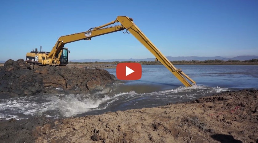 Digging a dike Cullinan Ranch