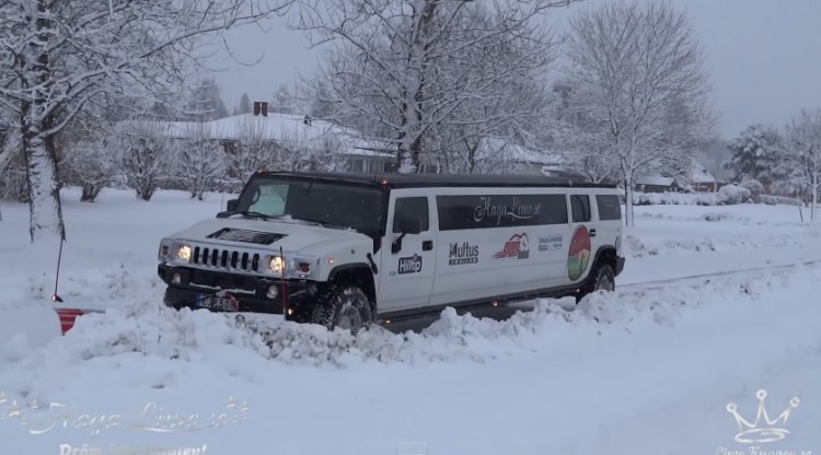 The Worlds First limo with a snow plow