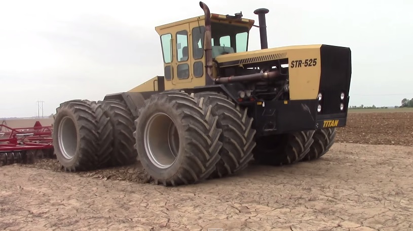 TITAN STR-525 4wd Tractor pulling a 50ft Kent Disc-O-Vator Series V and ...