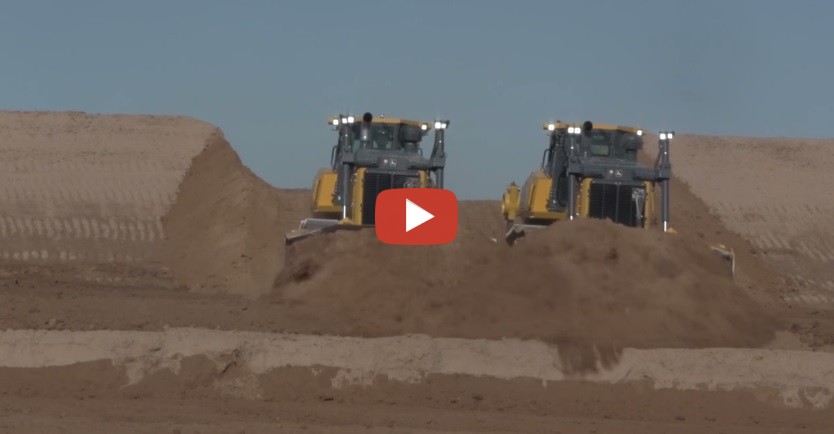 John Deere 1050K Crawler Dozers in action Working in tandem.