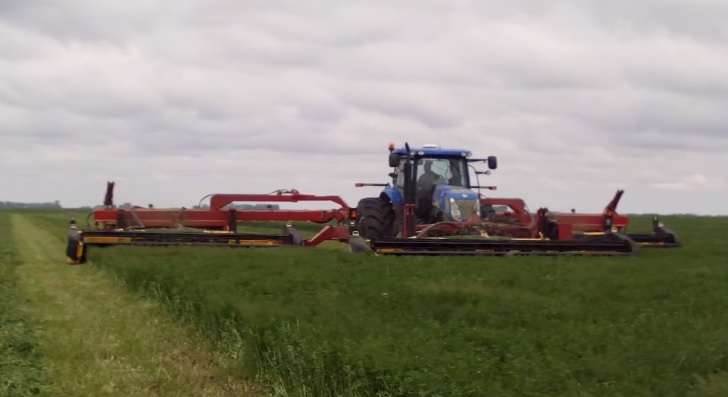 54 Feet of cutting power using 3 18 foot New Holland HS series haybines ...
