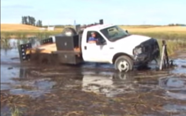 Swamp traxx, auxillary powered track machine.