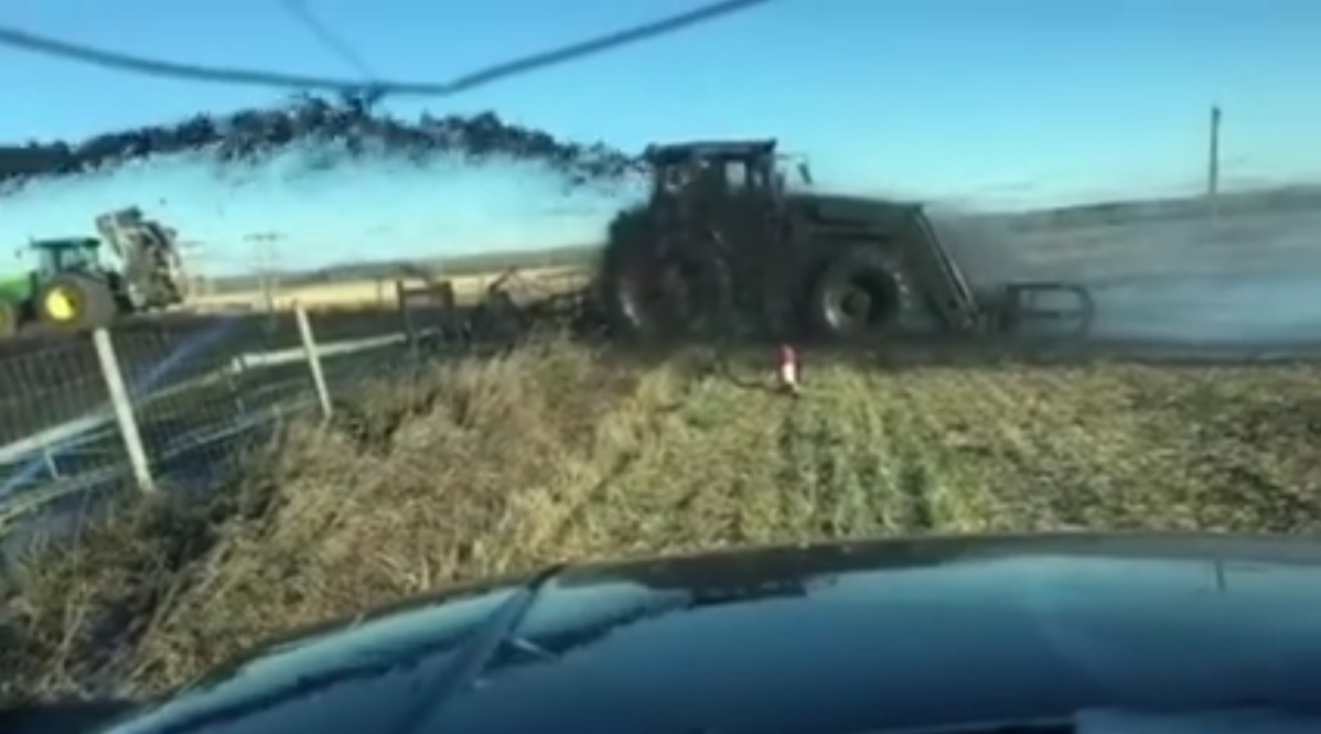 Shit!!! tractor on fire.