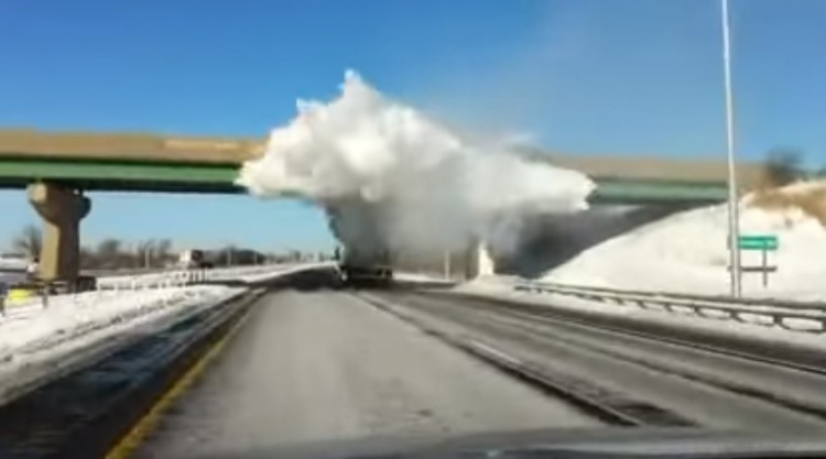 Snow Explodes As Truck Passes Under Bridge (Amazing Footage)