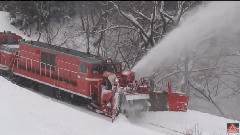 Locomotive Train Hits the Snow: Plow-Transformer