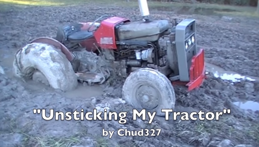 I used some logs and chain to get my severely stuck tractor unstuck ...