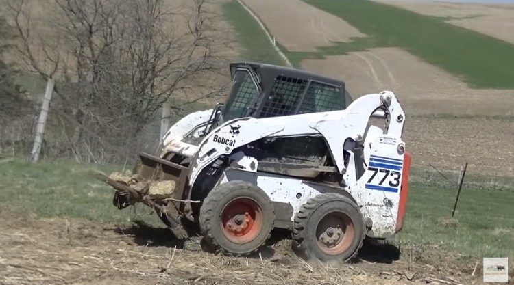 Out picking up rocks before we start planting! -How Farms Work-