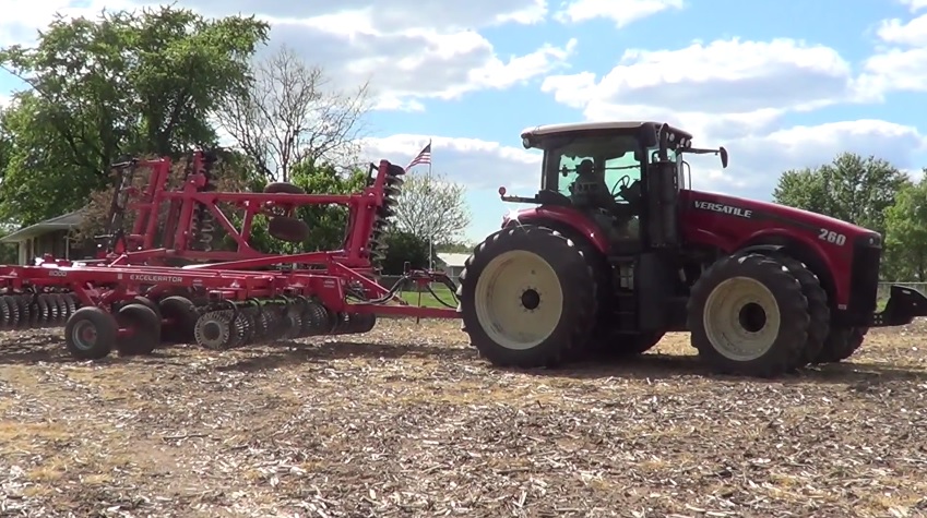 Versatile 260 Tractor pulling a 30 foot Krause Excellerator near ...