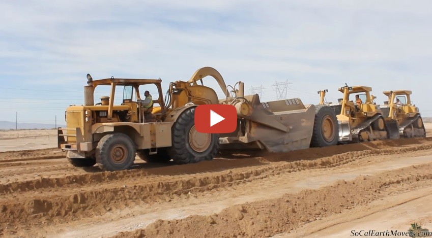 Classic CATERPILLAR 660B scrapers being push loaded by CAT D10N pushcat ...