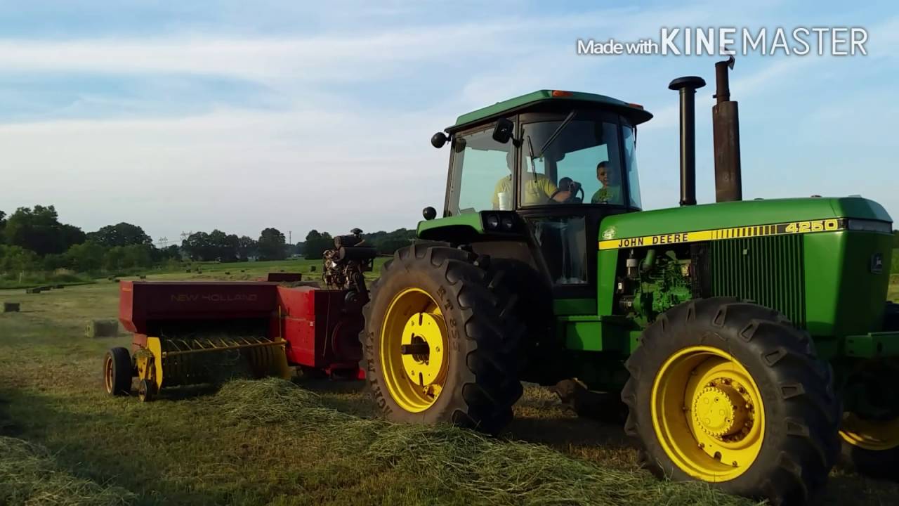 Baling calf hay with the John Deere 4250 and New Holland small baler ...