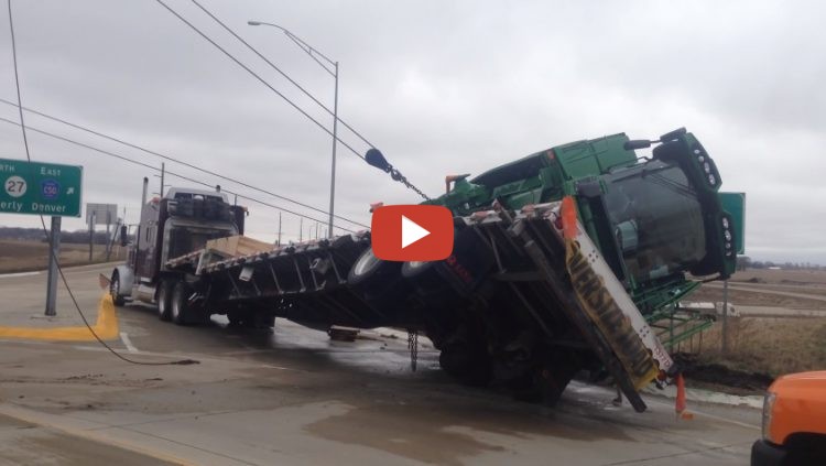 John Deere combine tipped over