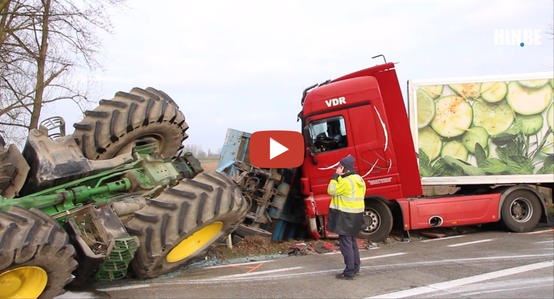 Big crash between truck and John Deere tractor.