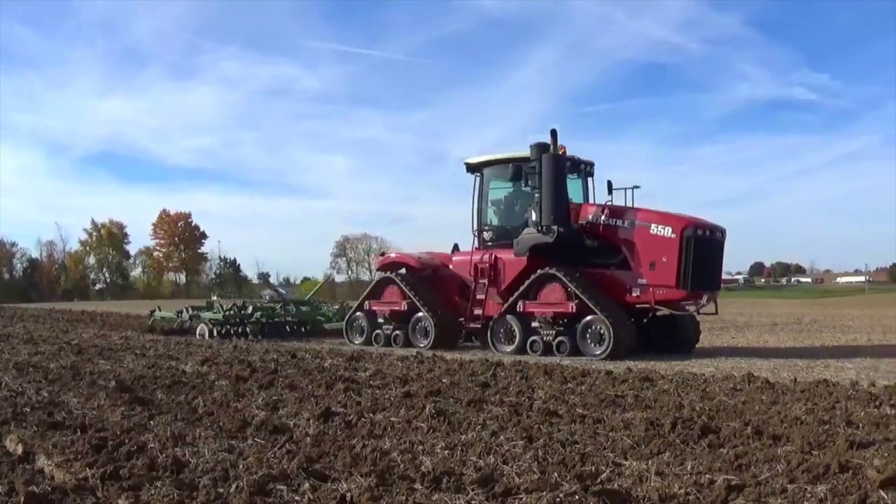 Versatile Delta Track 550 pulling a John Deere Chisel Plow -- Mike Less