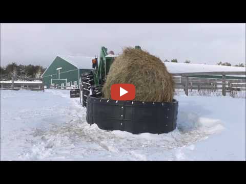 Ultimate Hay Ring - putting a round hay bale in with Tractor ...