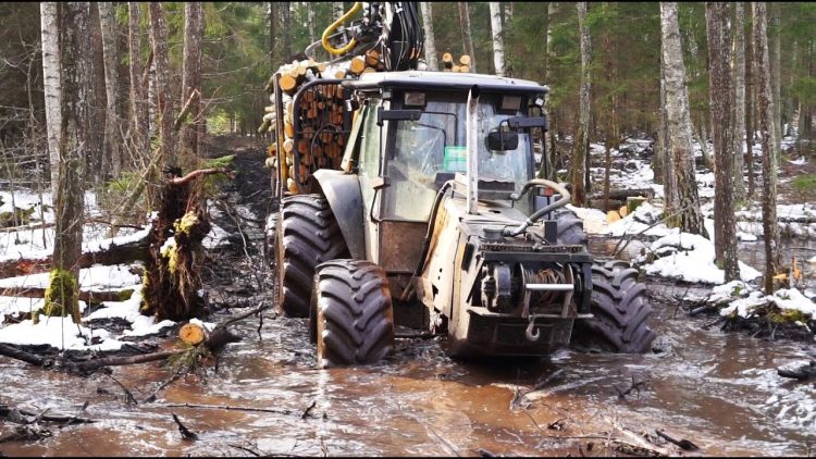 Valtra forestry tractor, John Deere 1110D and Timberjack 810B logging ...
