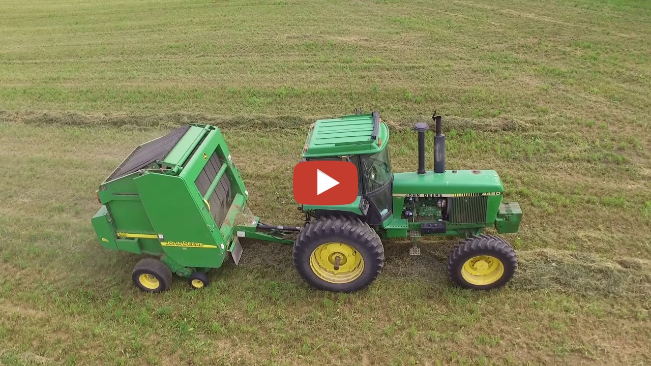 iowadairyboys is mowing and baling alfalfa with John Deere equipment