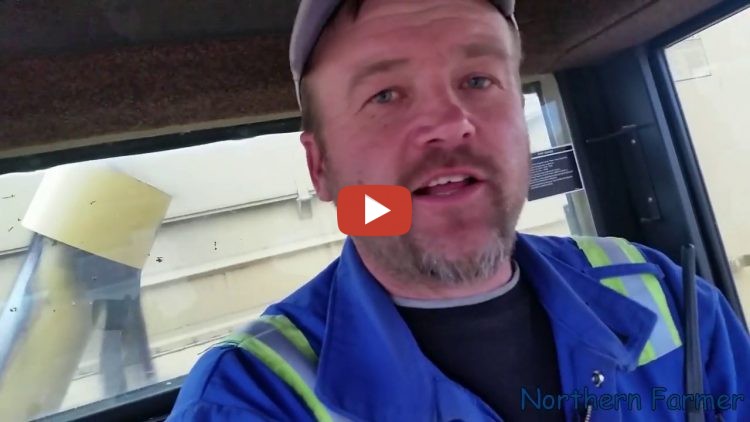 Northern farmer is combining canola with a New Holland