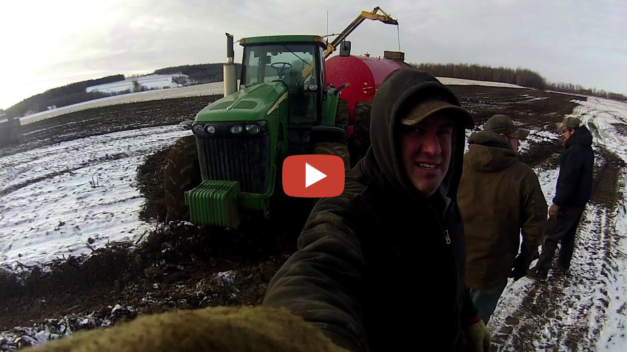 John Deere 8320 & Nuhn 6,000 gallon tanker loaded and stuck on January ...