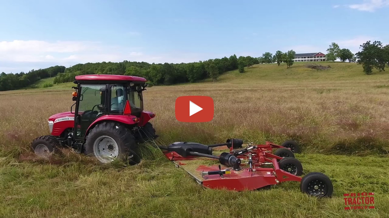 Big 10 ft Rhino TS10 Flex-Wing Mower for Utility Tractors.. Here with a ...