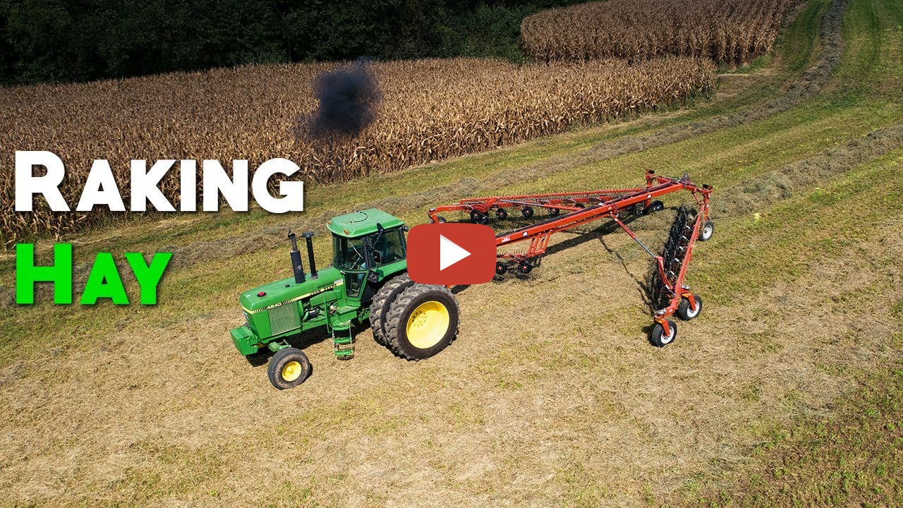 Raking Hay -John Deere with the RhinoAg RDF14 Wheel Rake -- How Farms Work