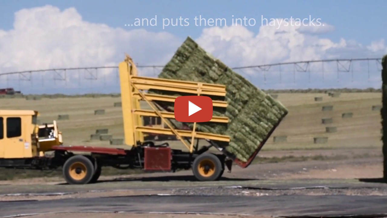 Baling and stacking hay -- Get a quick look at how hay is baled and ...