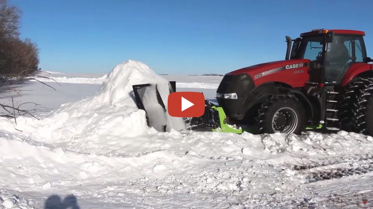 Snow Blower and Pushing Tractors At Work