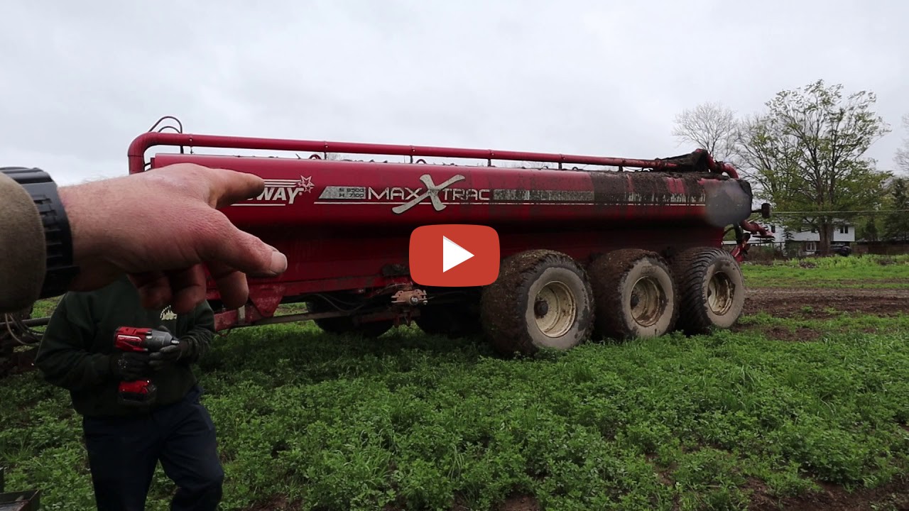 Broken axle and broken fences... Front left wheel broke off of Jamesway ...