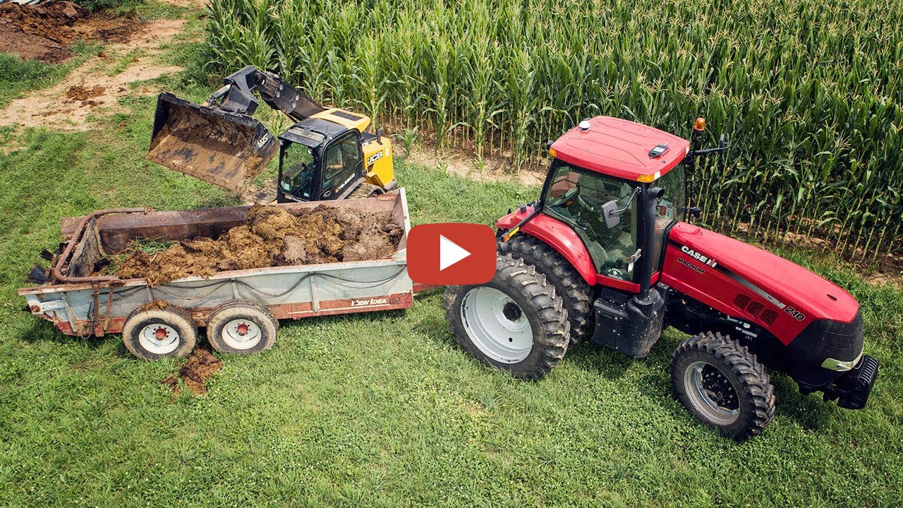 How Farms Work -- Spreading Manure with the CASE Magnum 210.. We hook ...