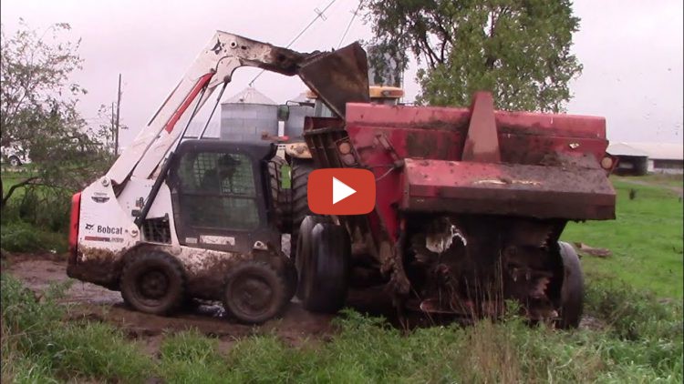 Hauling Manure in the MUD! with a Challenger tractor and a Bobcat ...
