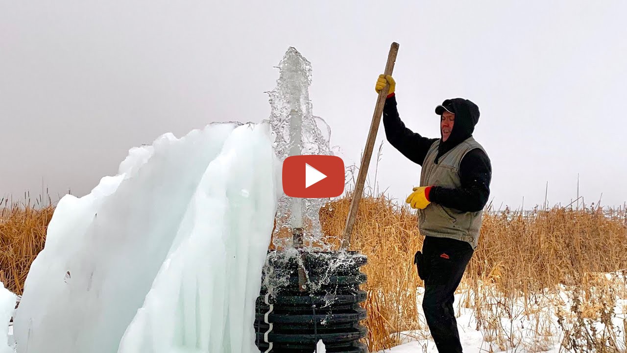 Larson Farms -- Winter Water Fountain - Dougo and Chet fix a lift ...
