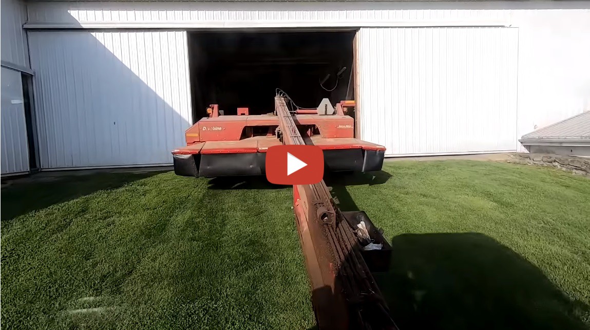 Mowing off our final 54 acres of spring Triticale. New Holland Tractor ...