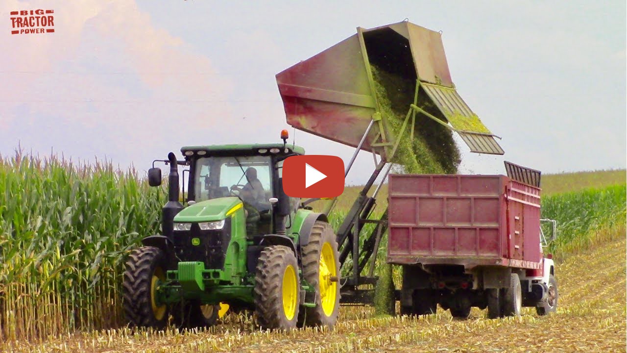 bigtractorpower - Filling a HARVESTORE silo with corn silage using dump trucks. Chopping corn ...