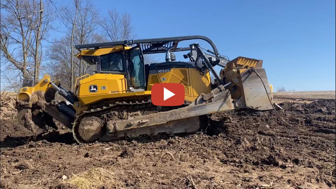 Pulling a huge John Deere dozer out of the mud - Claering forest ...