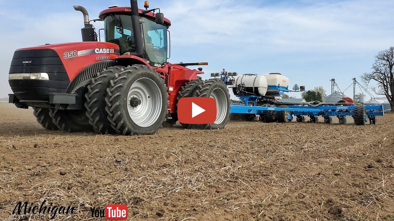 Case-IH Steiger 350 pulling a Monosem 16 row 30" corn planter in Ingham ...