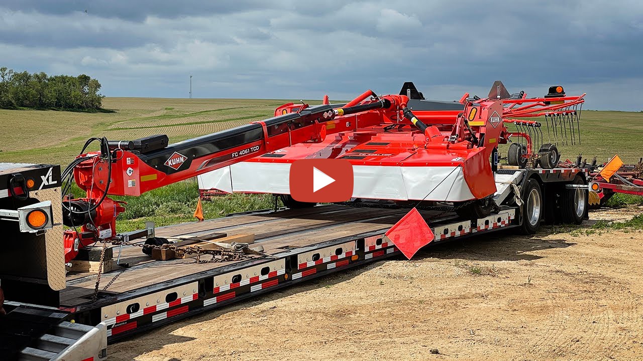 How Farms Work -- We receive a KUHN mower conditioner and rotary rake ...