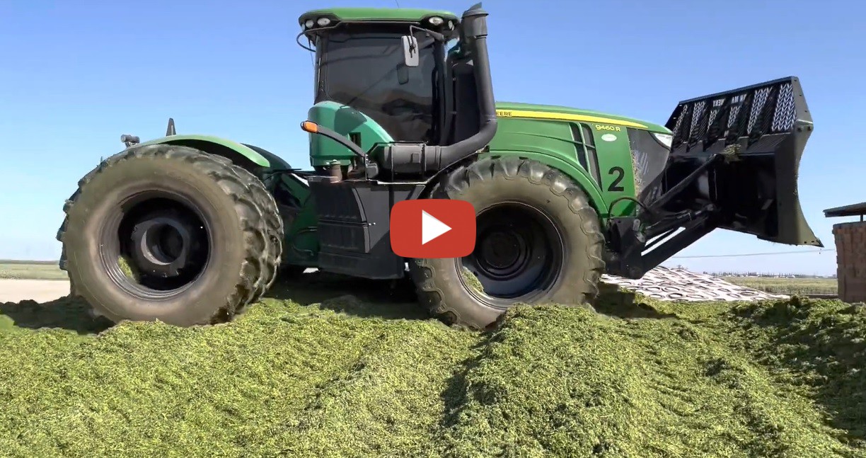 Chopping and packing hay. Claas Jaguar 990 and a John Deere 9700 ...