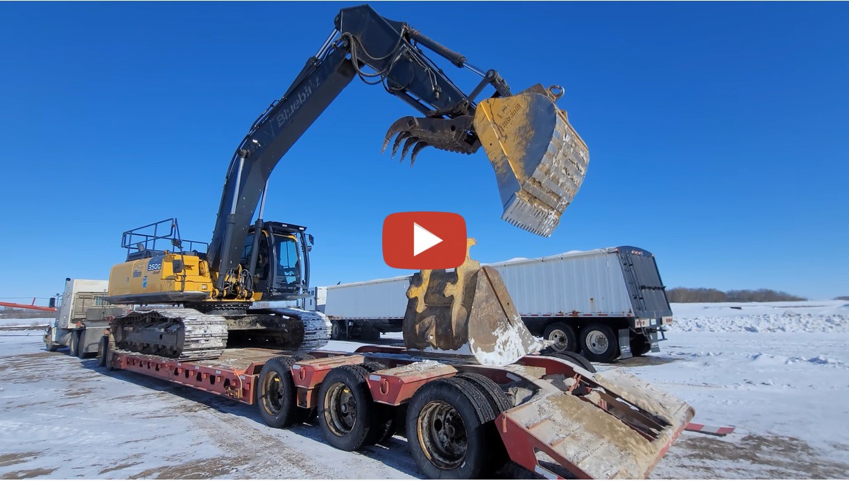 Mike Mitchell -- What is Mike doing now? The trackhoe has arrived as ...