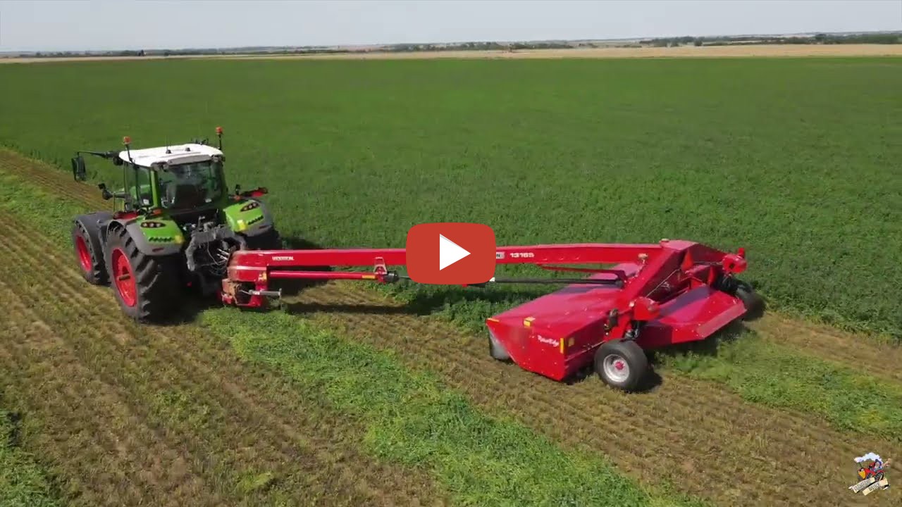 Mike Less - Farmhand Mike -- Mowing down a field of alfalfa hay using ...