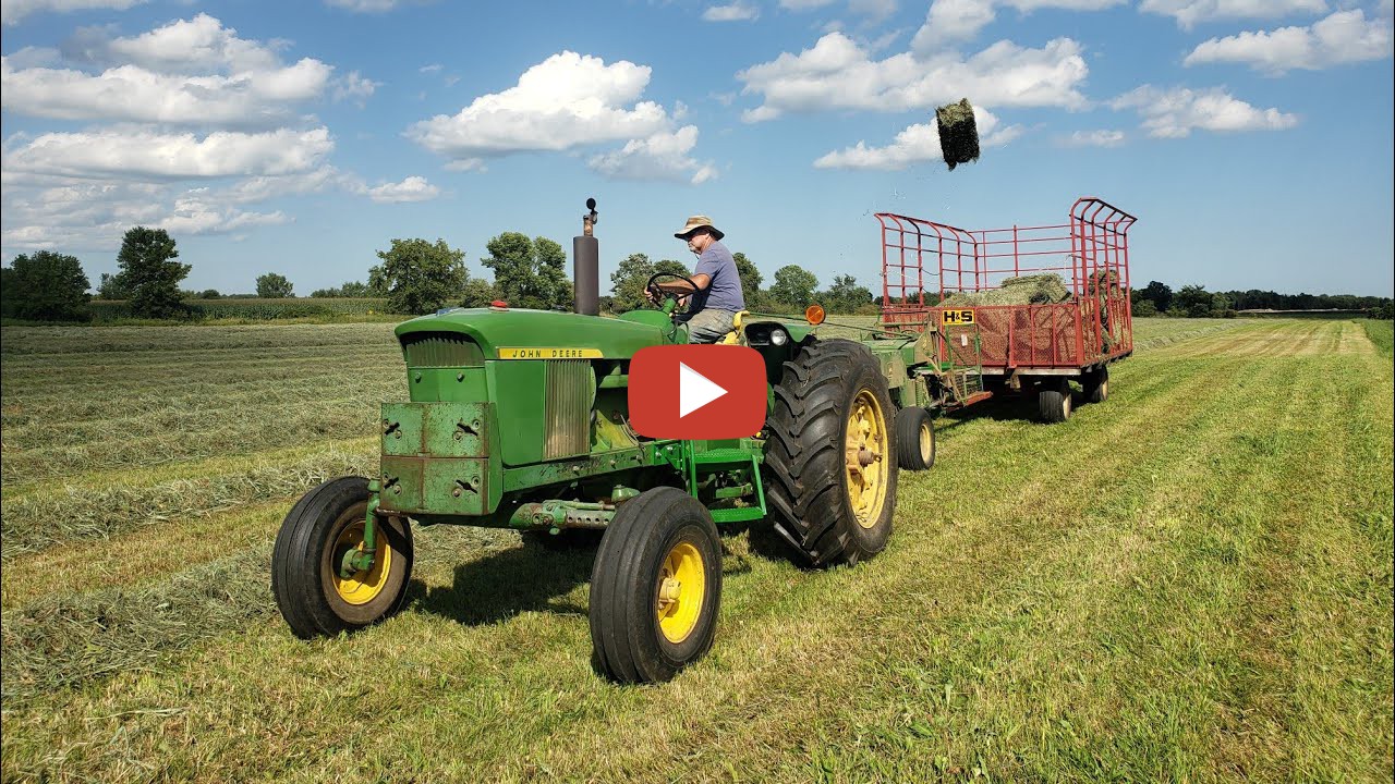 Baling Hay With The John Deere 4020 & John Deere 328 Small Square Baler. The grass field we ...