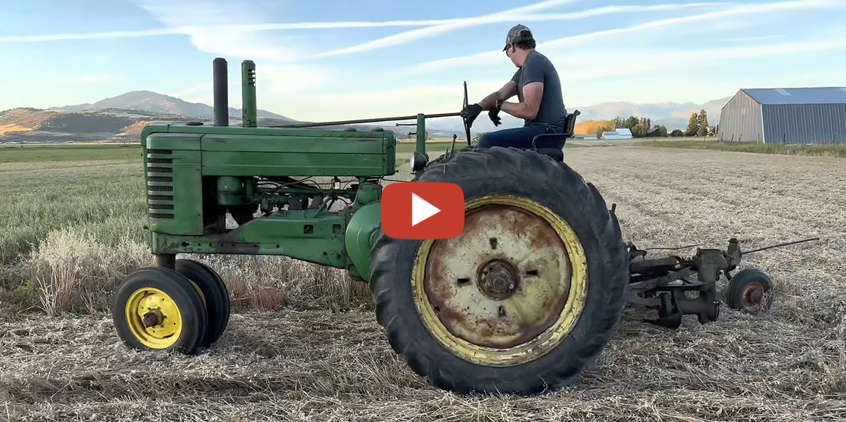 I am using the 1947 John Deere Model A (48 model year) Mowing grain hay ...