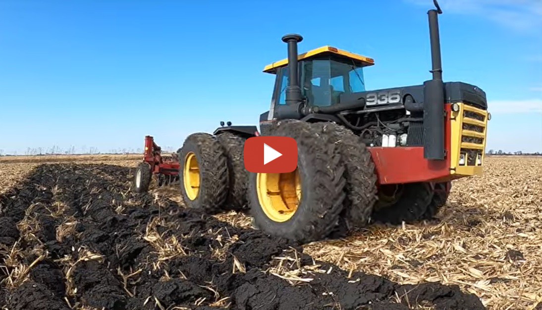 Plowing a harvested corn field with a Versatile 936 tractor and Salford ...